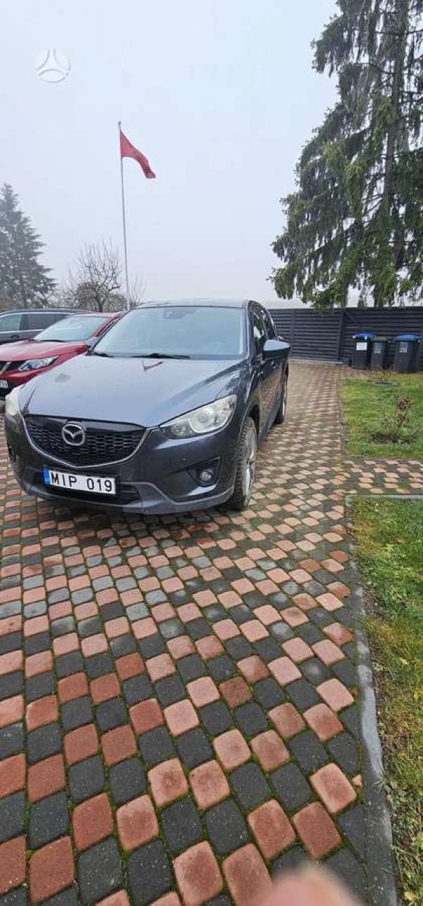 Grey Mazda CX-5 2013 in Vilnius, with an engine capacity of 2.19 L and mileage of 239 thousand km for 5000 €, photo 3 on AUTOMOTO.COM.LV