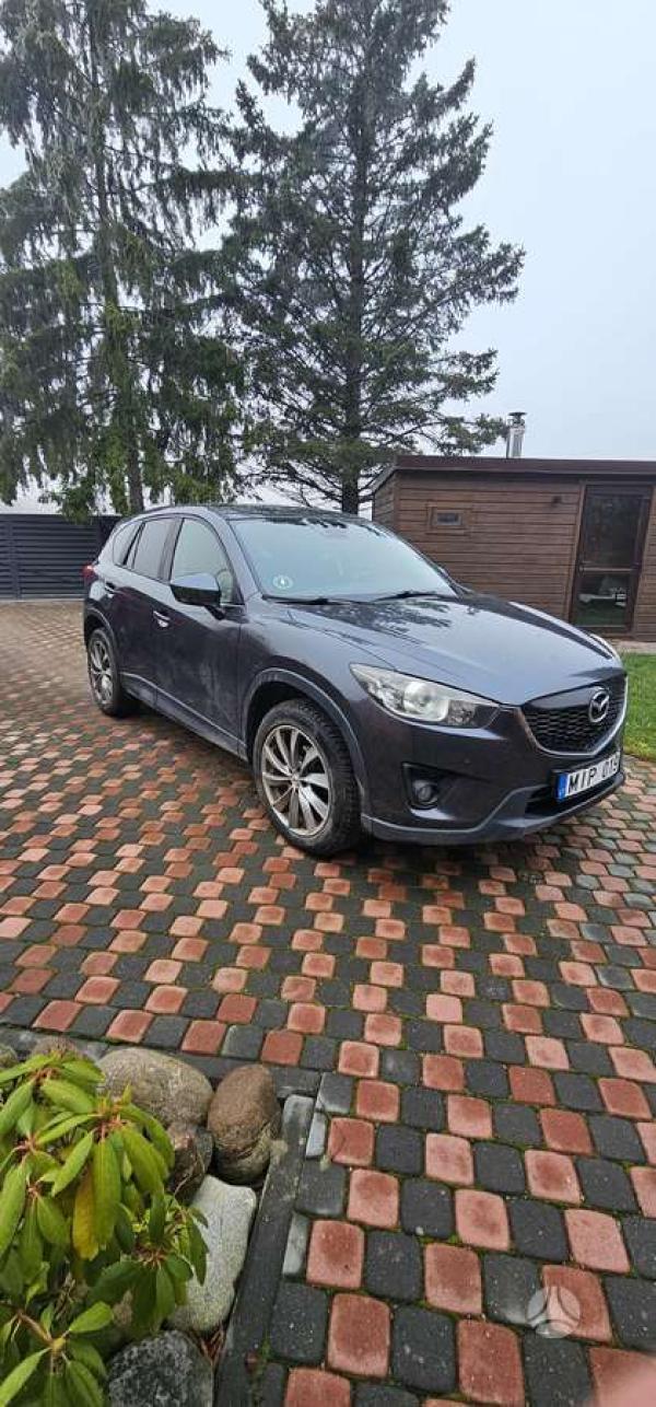 Grey Mazda CX-5 2013 in Vilnius, with an engine capacity of 2.19 L and mileage of 239 thousand km for 5000 €, photo 4 on AUTOMOTO.COM.LV