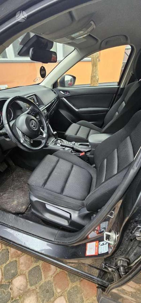Grey Mazda CX-5 2013 in Vilnius, with an engine capacity of 2.19 L and mileage of 239 thousand km for 5000 €, photo 6 on AUTOMOTO.COM.LV