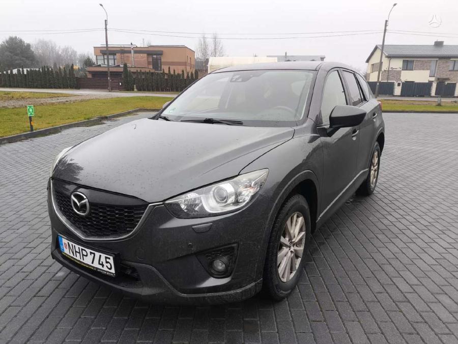 Grey Mazda CX-5 2013 in Siauliai, with an engine capacity of 2.20 L and mileage of 250 thousand km for 3490 €, photo 1 on AUTOMOTO.COM.LV