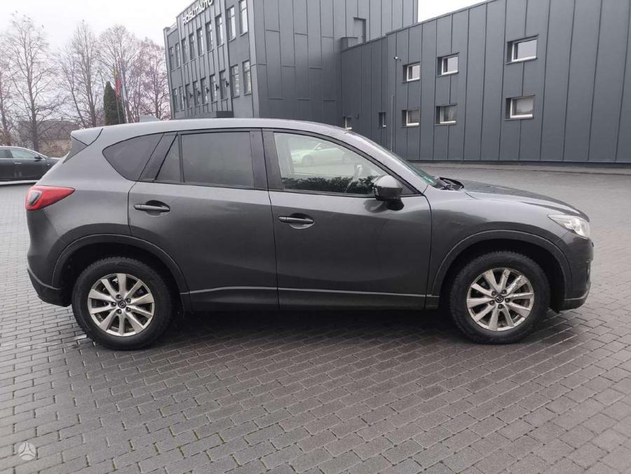 Grey Mazda CX-5 2013 in Siauliai, with an engine capacity of 2.20 L and mileage of 250 thousand km for 3490 €, photo 7 on AUTOMOTO.COM.LV