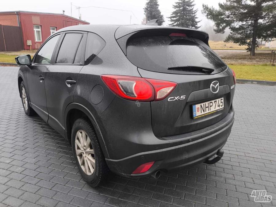 Grey Mazda CX-5 2013 in Siauliai, with an engine capacity of 2.20 L and mileage of 250 thousand km for 3490 €, photo 6 on AUTOMOTO.COM.LV