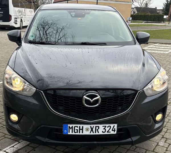Grey Mazda CX-5 2013 in Kelme, with an engine capacity of 2.20 L and mileage of 223 thousand km for 6999 €, photo 3 on AUTOMOTO.COM.LV