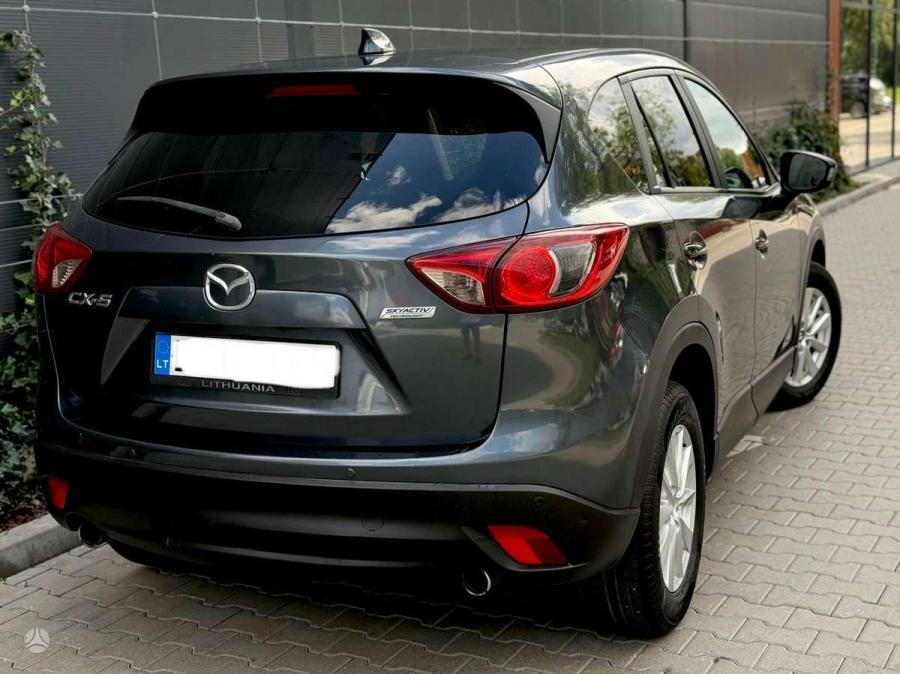 Grey Mazda CX-5 2013 in Klaipeda, with an engine capacity of 2.19 L and mileage of 297 thousand km for 6750 €, photo 9 on AUTOMOTO.COM.LV