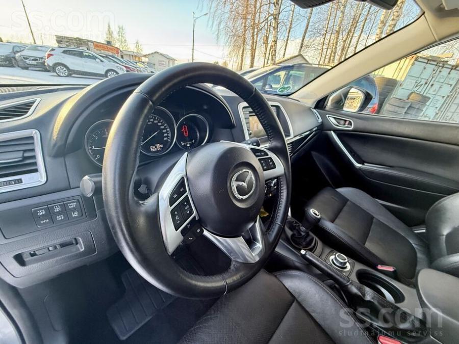 Grey Mazda CX-5 2013 in Riga, with an engine capacity of 2.20 L and mileage of 0 thousand km for 7550 €, photo 10 on AUTOMOTO.COM.LV