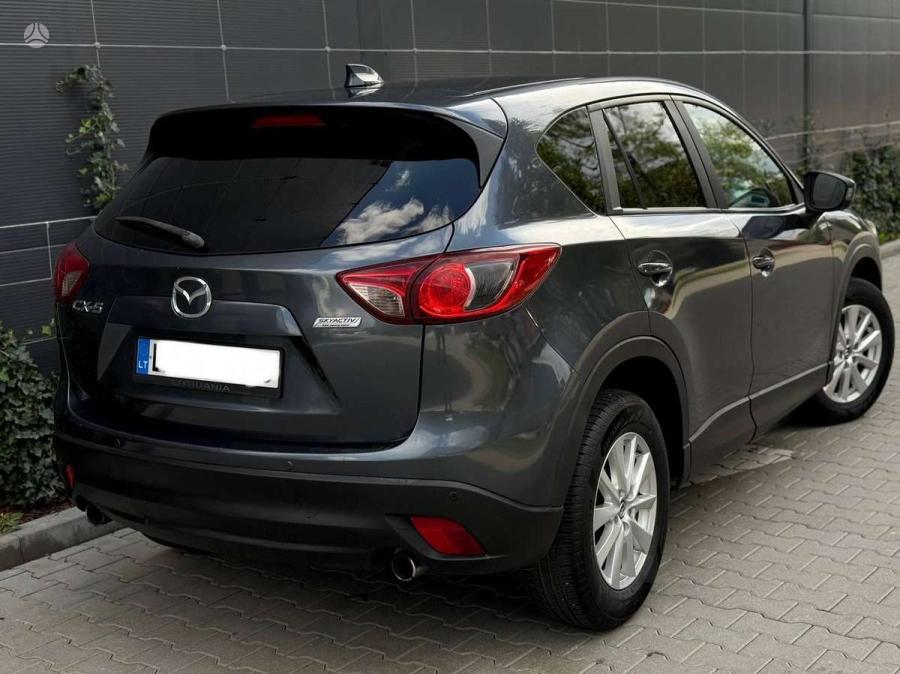 Grey Mazda CX-5 2013 in Klaipeda, with an engine capacity of 2.19 L and mileage of 297 thousand km for 6750 €, photo 6 on AUTOMOTO.COM.LV