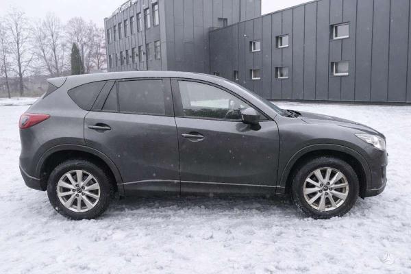 Grey Mazda CX-5 2013 in Siauliai, with an engine capacity of 2.19 L and mileage of 250 thousand km for 2800 €, photo 7 on AUTOMOTO.COM.LV