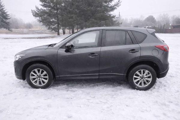 Grey Mazda CX-5 2013 in Siauliai, with an engine capacity of 2.19 L and mileage of 250 thousand km for 2800 €, photo 8 on AUTOMOTO.COM.LV