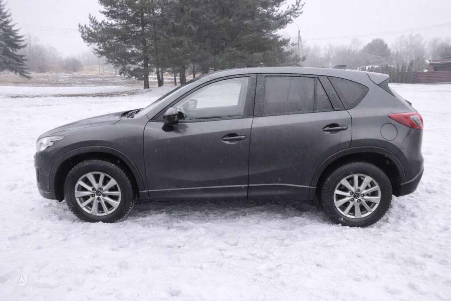Grey Mazda CX-5 2013 in Siauliai, with an engine capacity of 2.19 L and mileage of 250 thousand km for 2800 €, photo 8 on AUTOMOTO.COM.LV