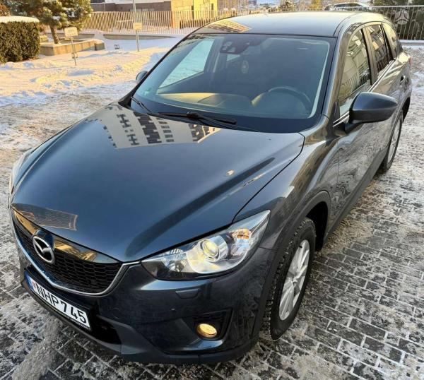 Grey Mazda CX-5 2013 in Vilnius, with an engine capacity of 2.19 L and mileage of 250 thousand km for 3900 €, photo 2 on AUTOMOTO.COM.LV