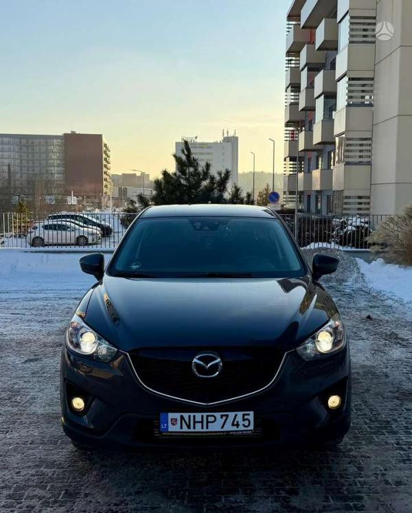Grey Mazda CX-5 2013 in Vilnius, with an engine capacity of 2.19 L and mileage of 250 thousand km for 3900 €, photo 3 on AUTOMOTO.COM.LV