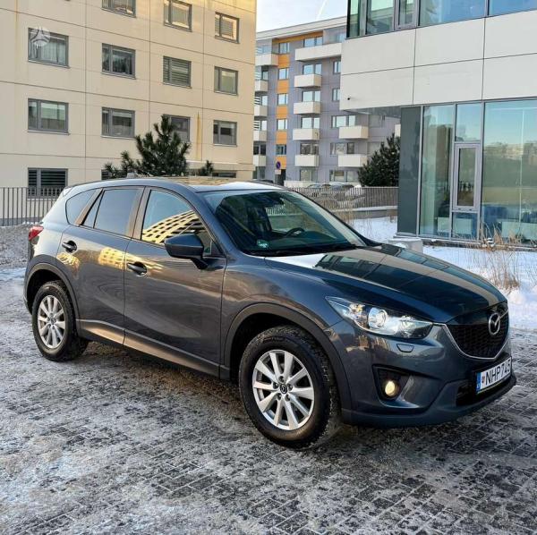 Grey Mazda CX-5 2013 in Vilnius, with an engine capacity of 2.19 L and mileage of 250 thousand km for 3900 €, photo 4 on AUTOMOTO.COM.LV