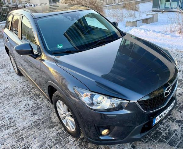 Grey Mazda CX-5 2013 in Vilnius, with an engine capacity of 2.19 L and mileage of 250 thousand km for 3900 €, photo 5 on AUTOMOTO.COM.LV