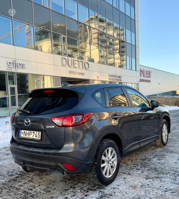 Grey Mazda CX-5 2013 in Vilnius, with an engine capacity of 2.19 L and mileage of 250 thousand km for 3900 €, photo 7 on AUTOMOTO.COM.LV