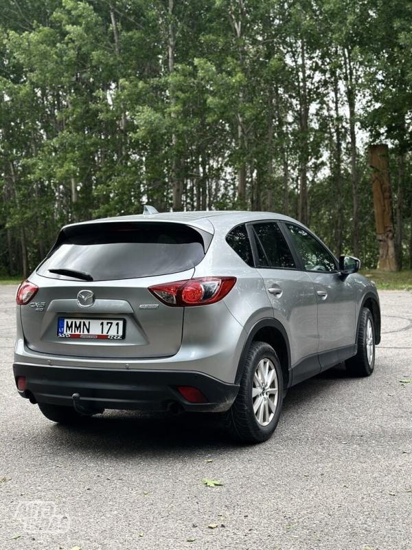 Grey Mazda CX-5 2013 in Plunge, with an engine capacity of 2.20 L and mileage of 224 thousand km for 7200 €, photo 5 on AUTOMOTO.COM.LV