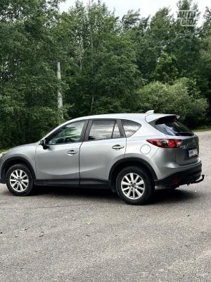 Grey Mazda CX-5 2013 in Plunge, with an engine capacity of 2.20 L and mileage of 224 thousand km for 7200 €, photo 6 on AUTOMOTO.COM.LV