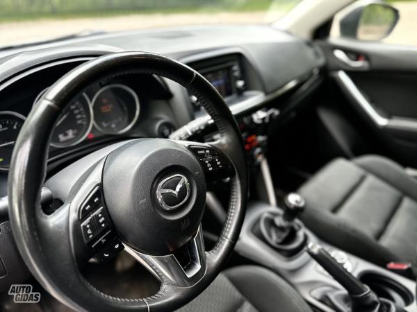 Grey Mazda CX-5 2013 in Plunge, with an engine capacity of 2.20 L and mileage of 224 thousand km for 7200 €, photo 9 on AUTOMOTO.COM.LV
