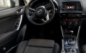 Grey Mazda CX-5 2013 in Klaipeda, with an engine capacity of 2.19 L and mileage of 297 thousand km for 6850 €, photo 12 on AUTOMOTO.COM.LV