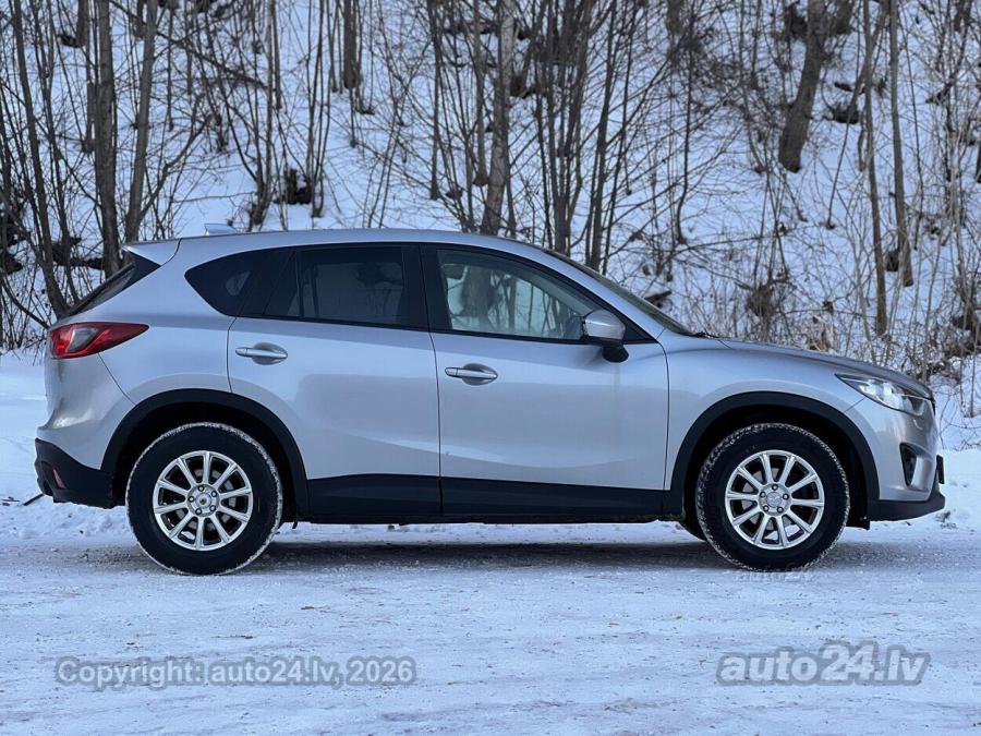 Grey Mazda CX-5 2013 in Tallinn, with an engine capacity of 2.00 L and mileage of 143 thousand km for 8990 €, photo 8 on AUTOMOTO.COM.LV