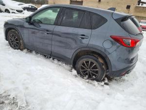 Grey Mazda CX-5 2013 in Taurage, with an engine capacity of 2.19 L and mileage of 227 thousand km for 3200 €, photo 4 on AUTOMOTO.COM.LV