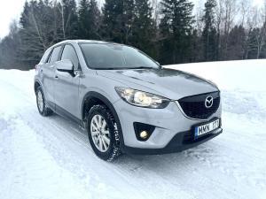 Grey Mazda CX-5 2013 in Plunge, with an engine capacity of 2.20 L and mileage of 230 thousand km for 6450 €, photo 3 on AUTOMOTO.COM.LV