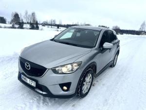 Grey Mazda CX-5 2013 in Plunge, with an engine capacity of 2.20 L and mileage of 230 thousand km for 6450 €, photo 4 on AUTOMOTO.COM.LV
