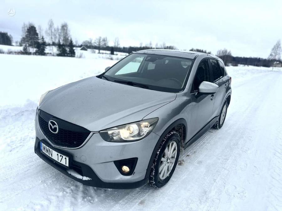 Grey Mazda CX-5 2013 in Plunge, with an engine capacity of 2.20 L and mileage of 230 thousand km for 6450 €, photo 4 on AUTOMOTO.COM.LV