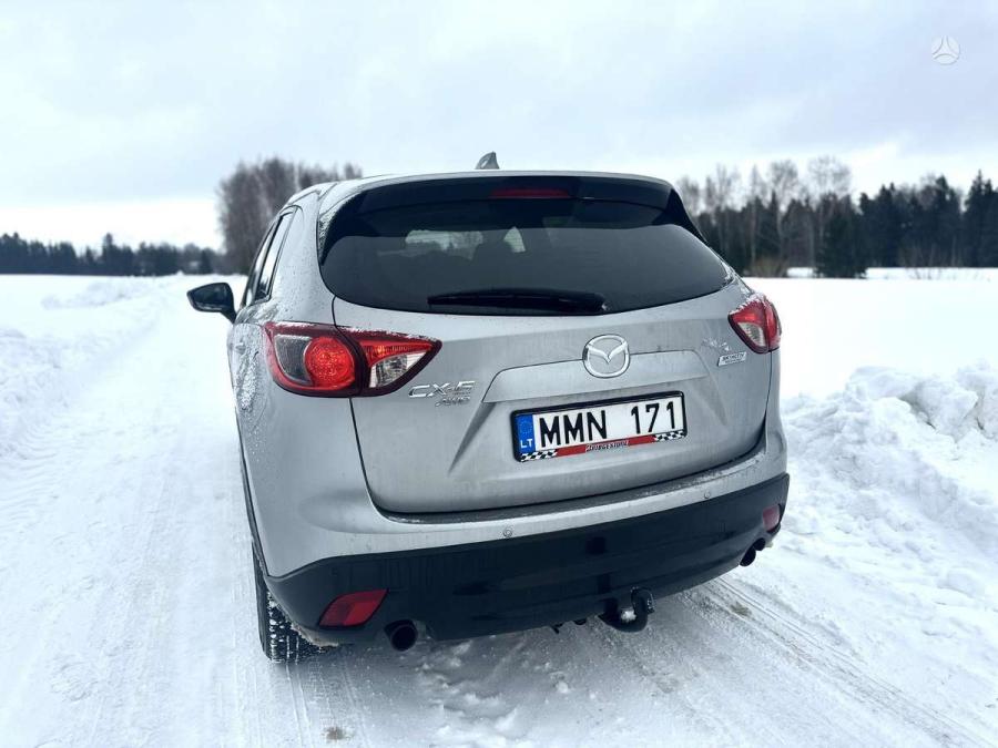 Grey Mazda CX-5 2013 in Plunge, with an engine capacity of 2.20 L and mileage of 230 thousand km for 6450 €, photo 5 on AUTOMOTO.COM.LV