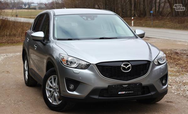 Grey Mazda CX-5 2013 in Petrikaiciai, with an engine capacity of 2.20 L and mileage of 222 thousand km for 7699 €, photo 5 on AUTOMOTO.COM.LV