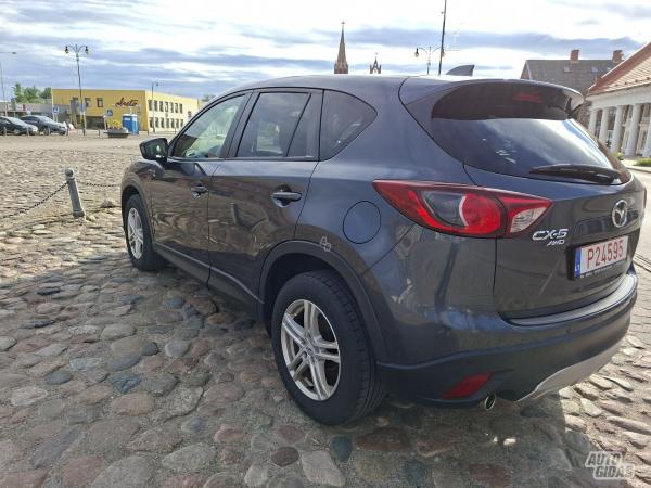Grey Mazda CX-5 2013 in Vilnius, with an engine capacity of 2.20 L and mileage of 226 thousand km for 7250 €, photo 2 on AUTOMOTO.COM.LV