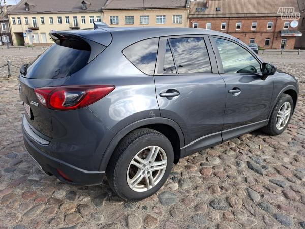 Grey Mazda CX-5 2013 in Vilnius, with an engine capacity of 2.20 L and mileage of 226 thousand km for 7250 €, photo 6 on AUTOMOTO.COM.LV