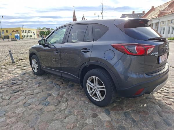 Grey Mazda CX-5 2013 in Vilnius, with an engine capacity of 2.20 L and mileage of 226 thousand km for 7250 €, photo 7 on AUTOMOTO.COM.LV