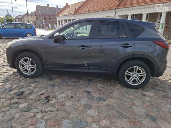 Grey Mazda CX-5 2013 in Vilnius, with an engine capacity of 2.20 L and mileage of 226 thousand km for 7250 €, photo 8 on AUTOMOTO.COM.LV