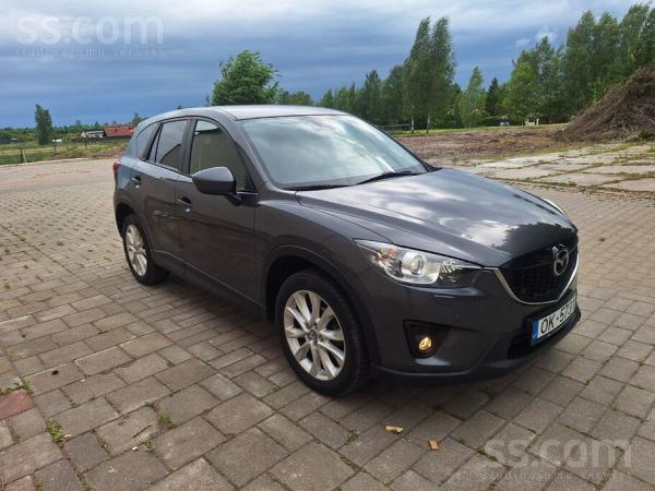 Grey Mazda CX-5 2013 in Saldus, with an engine capacity of 2.20 L and mileage of 315 thousand km for 5950 €, photo 5 on AUTOMOTO.COM.LV