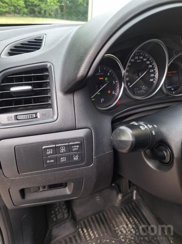 Grey Mazda CX-5 2013 in Saldus, with an engine capacity of 2.20 L and mileage of 315 thousand km for 5950 €, photo 7 on AUTOMOTO.COM.LV