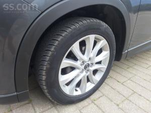 Grey Mazda CX-5 2013 in Saldus, with an engine capacity of 2.20 L and mileage of 315 thousand km for 5950 €, photo 17 on AUTOMOTO.COM.LV