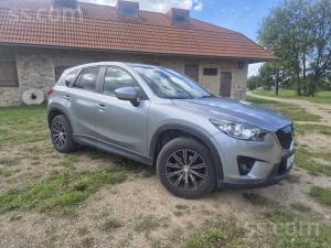Pelēks Mazda CX-5 2013 Rīga, ar dzinēja tilpumu 2.20 L un nobraukumu 246 tūkst. km par 7390 €, foto 1 vietnē AUTOMOTO.COM.LV