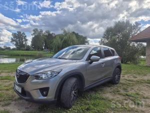Pelēks Mazda CX-5 2013 Rīga, ar dzinēja tilpumu 2.20 L un nobraukumu 246 tūkst. km par 7390 €, foto 4 vietnē AUTOMOTO.COM.LV