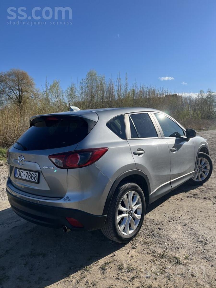 Grey Mazda CX-5 2013 in Jelgava, with an engine capacity of 2.20 L and mileage of 182 thousand km for 8555 €, photo 4 on AUTOMOTO.COM.LV