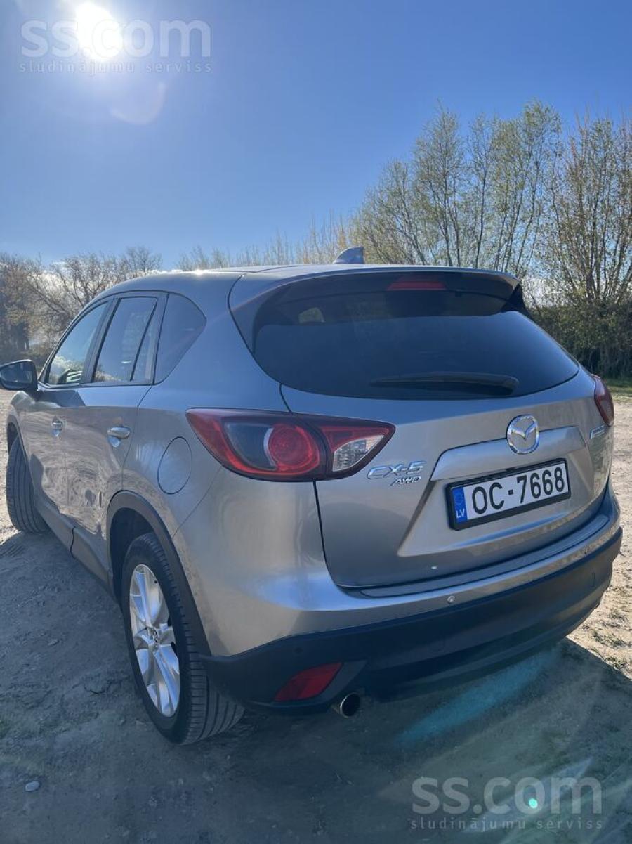 Grey Mazda CX-5 2013 in Jelgava, with an engine capacity of 2.20 L and mileage of 182 thousand km for 8555 €, photo 6 on AUTOMOTO.COM.LV