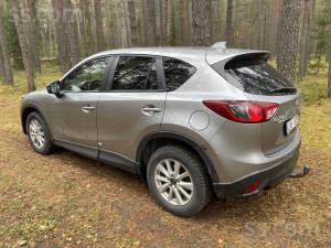 Pelēks Mazda CX-5 2013 Ogre, ar dzinēja tilpumu 2.20 L un nobraukumu 285 tūkst. km par 8000 €, foto 3 vietnē AUTOMOTO.COM.LV
