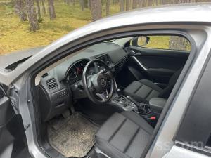 Pelēks Mazda CX-5 2013 Ogre, ar dzinēja tilpumu 2.20 L un nobraukumu 285 tūkst. km par 8000 €, foto 6 vietnē AUTOMOTO.COM.LV