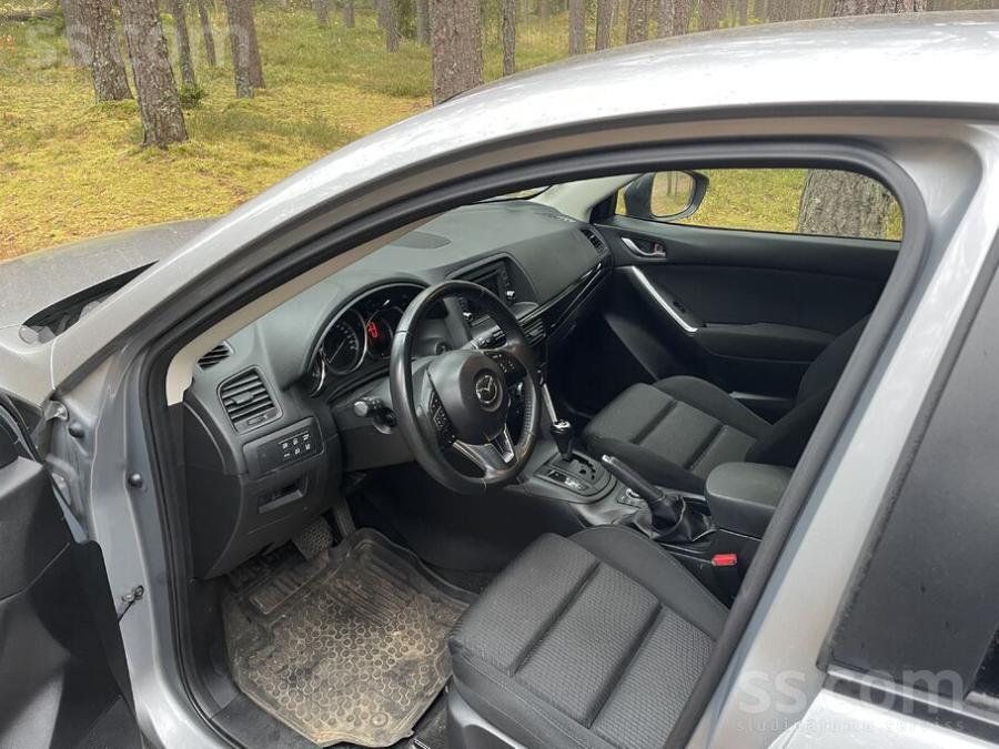 Pelēks Mazda CX-5 2013 Ogre, ar dzinēja tilpumu 2.20 L un nobraukumu 285 tūkst. km par 8000 €, foto 6 vietnē AUTOMOTO.COM.LV