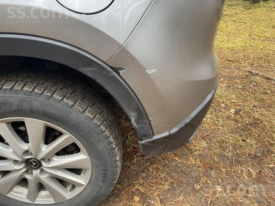 Pelēks Mazda CX-5 2013 Ogre, ar dzinēja tilpumu 2.20 L un nobraukumu 285 tūkst. km par 8000 €, foto 13 vietnē AUTOMOTO.COM.LV