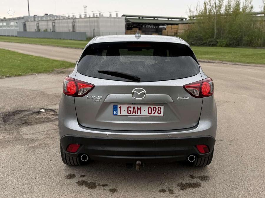 Pelēks Mazda CX-5 2013 Tauragė, ar dzinēja tilpumu 2.19 L un nobraukumu 178 tūkst. km par 5800 €, foto 7 vietnē AUTOMOTO.COM.LV