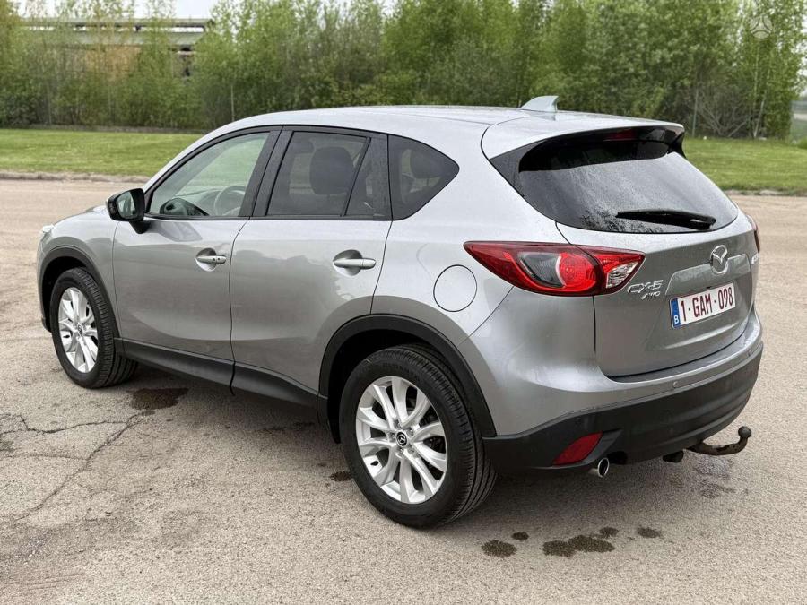 Pelēks Mazda CX-5 2013 Tauragė, ar dzinēja tilpumu 2.19 L un nobraukumu 178 tūkst. km par 5800 €, foto 8 vietnē AUTOMOTO.COM.LV