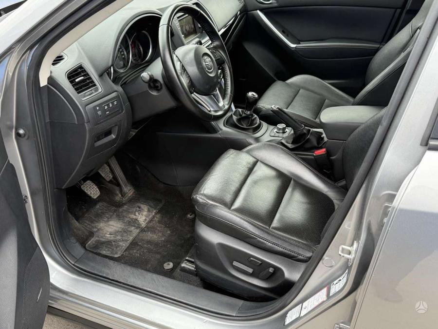 Pelēks Mazda CX-5 2013 Tauragė, ar dzinēja tilpumu 2.19 L un nobraukumu 178 tūkst. km par 5800 €, foto 10 vietnē AUTOMOTO.COM.LV