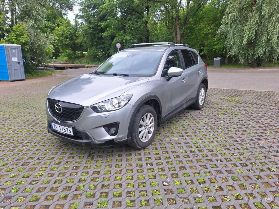 Grey Mazda CX-5 2013 in Panevezys, with an engine capacity of 2.19 L and mileage of 197 thousand km for 3900 €, photo 1 on AUTOMOTO.COM.LV