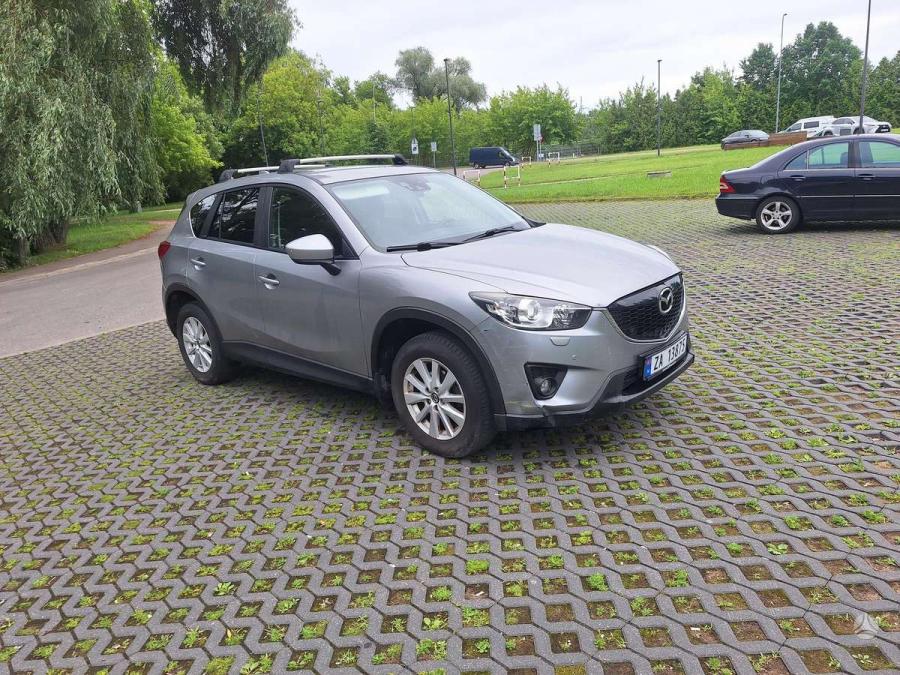 Grey Mazda CX-5 2013 in Panevezys, with an engine capacity of 2.19 L and mileage of 197 thousand km for 3900 €, photo 5 on AUTOMOTO.COM.LV