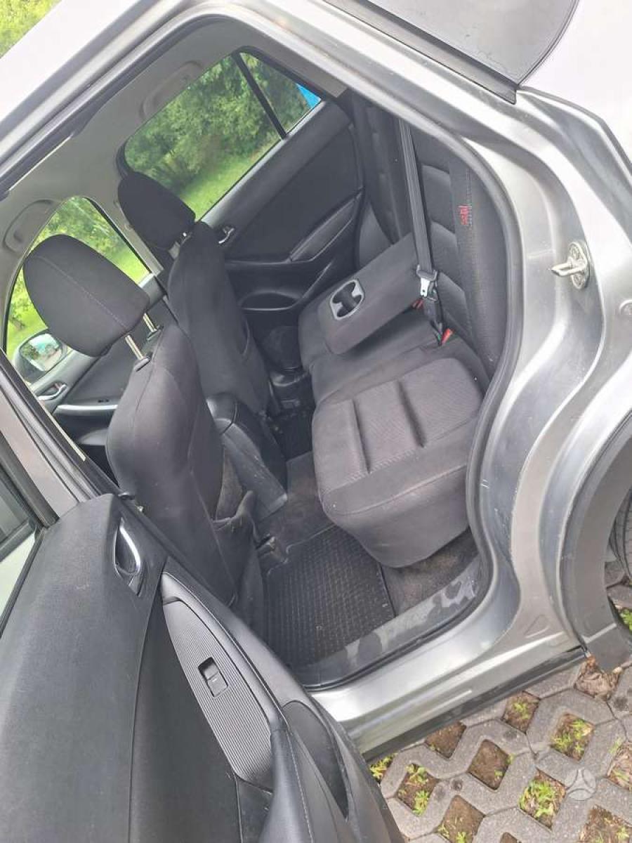 Grey Mazda CX-5 2013 in Panevezys, with an engine capacity of 2.19 L and mileage of 197 thousand km for 3900 €, photo 11 on AUTOMOTO.COM.LV
